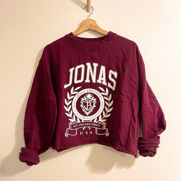 Urban Outfitters | Tops | Jonas Brothers Cropped Maroon Crew Neck ...
